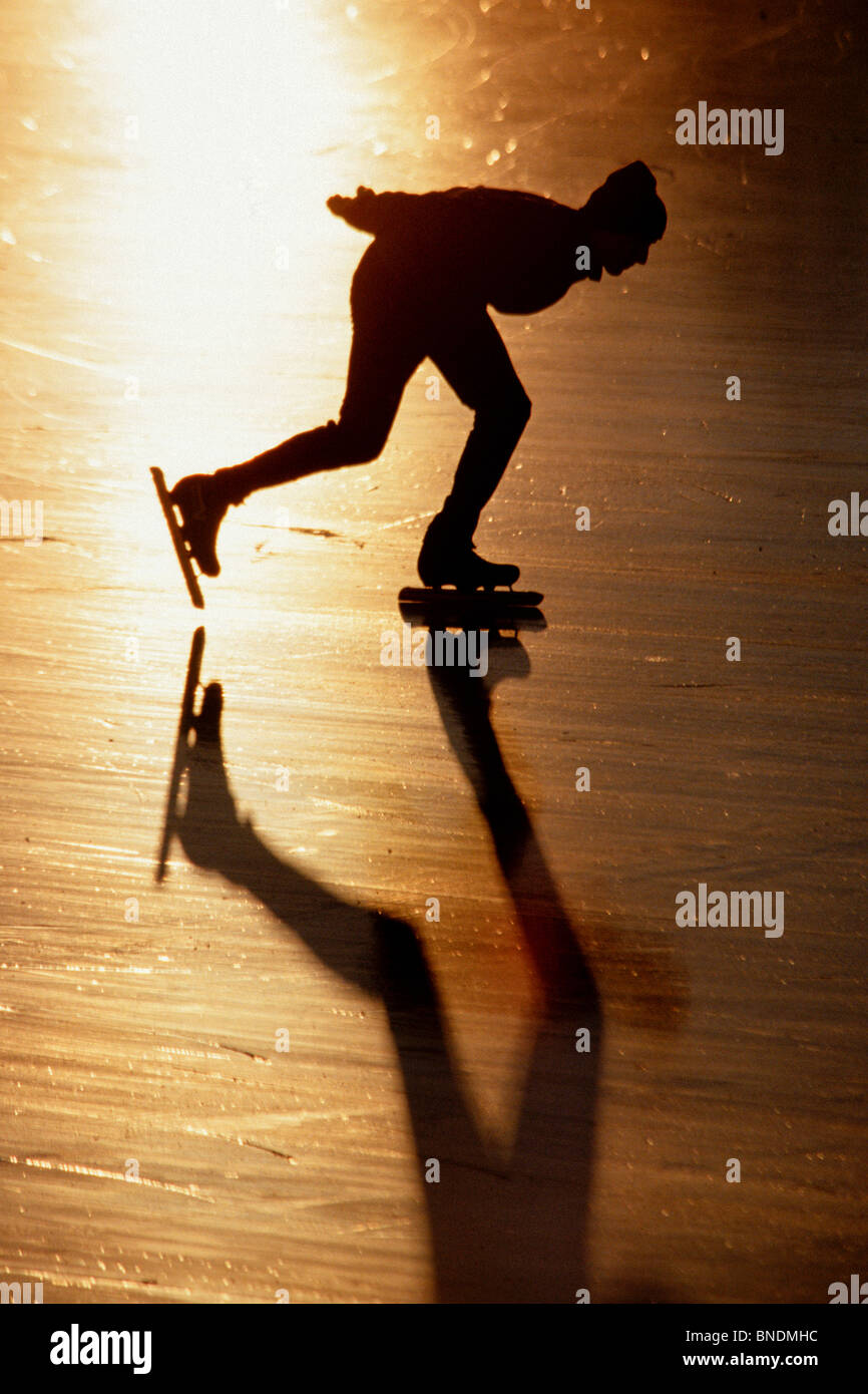 Shadow and Silhouette of speed skater Stock Photo - Alamy