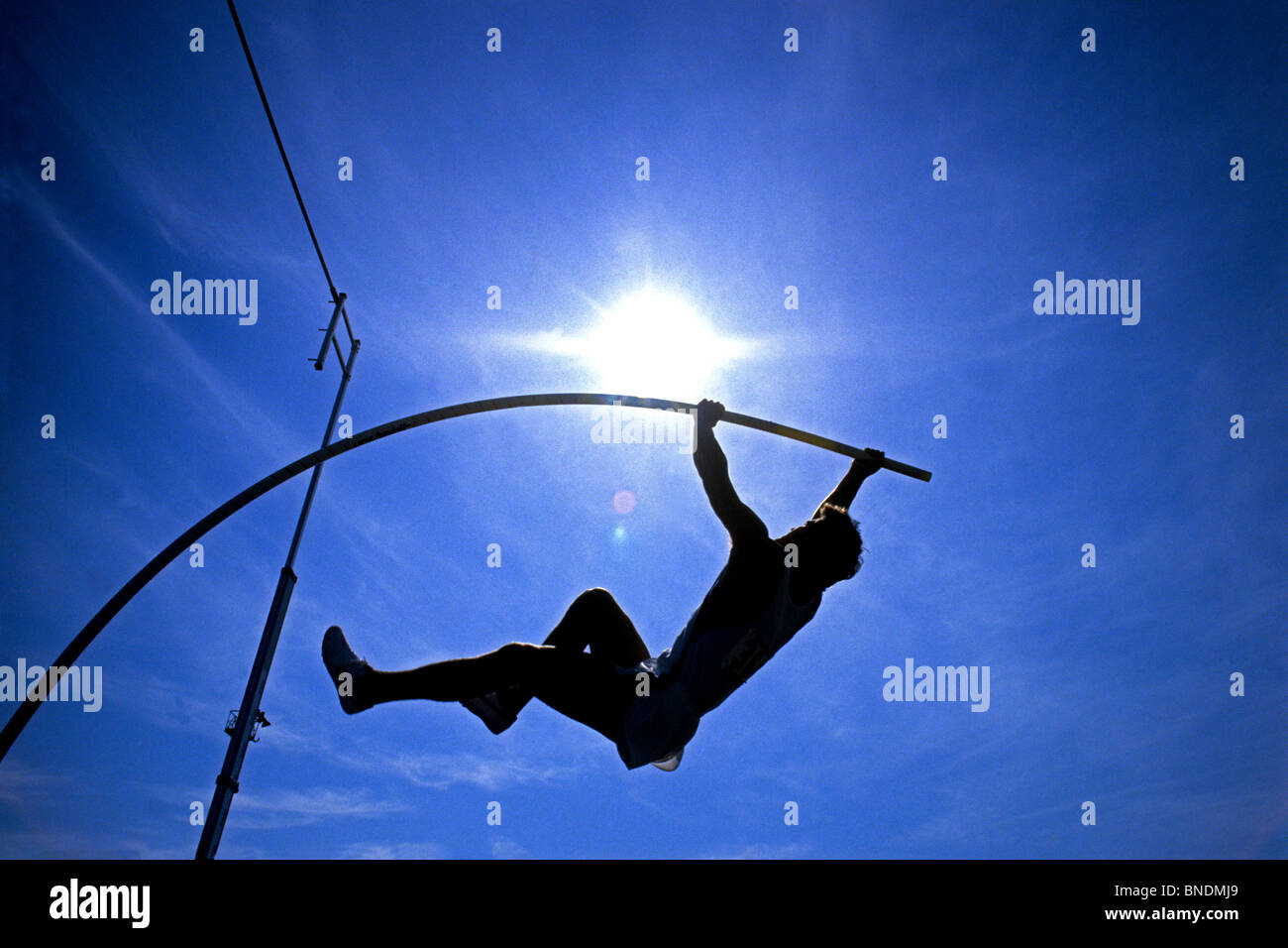Silhouette of male pole vaulter Stock Photo - Alamy