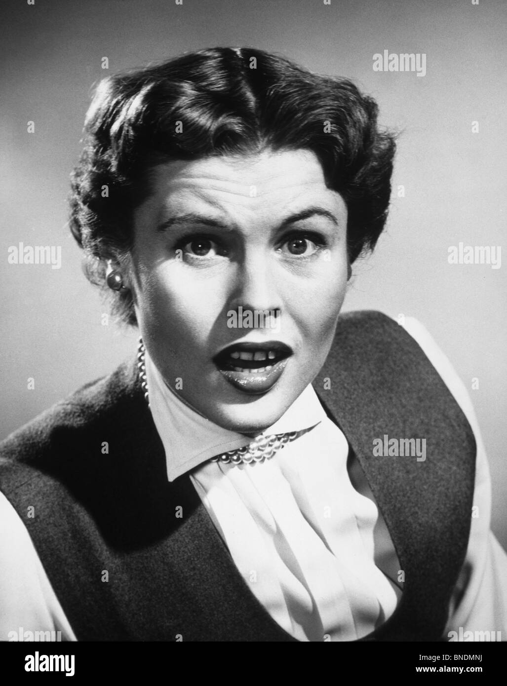 Woman mouth open surprised expression Black and White Stock Photos ...