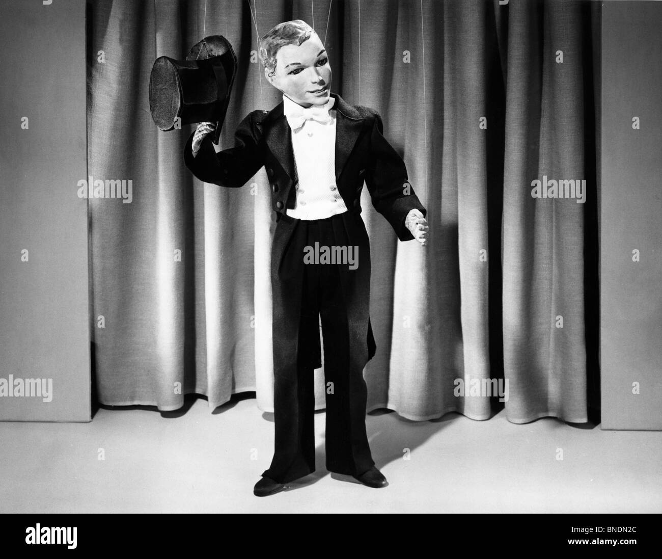Close-up of puppet holding top hat Stock Photo - Alamy