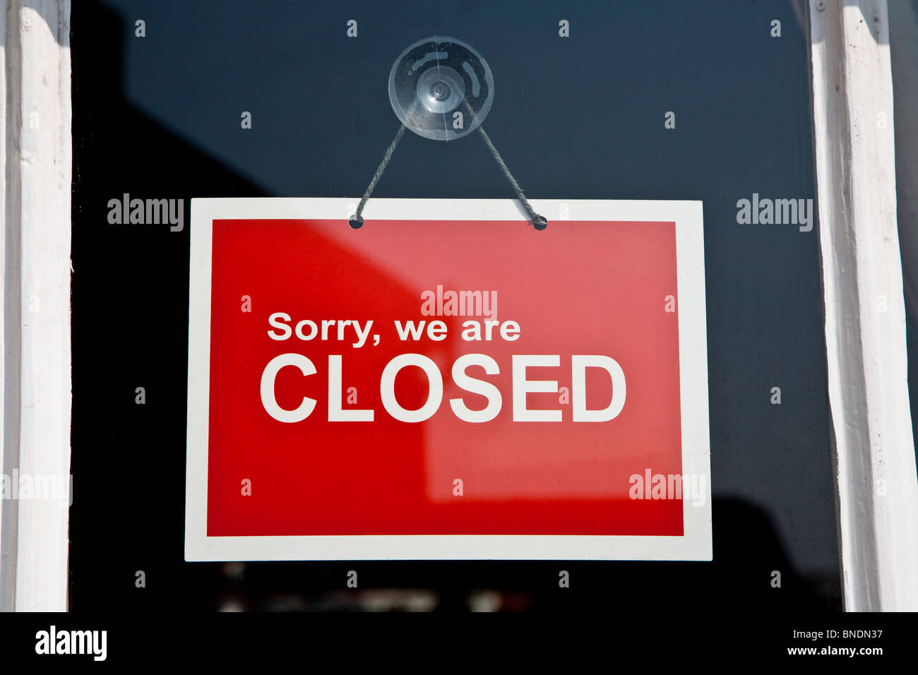 Sorry, we are closed sign, in window of public house, Farnham Surrey ...