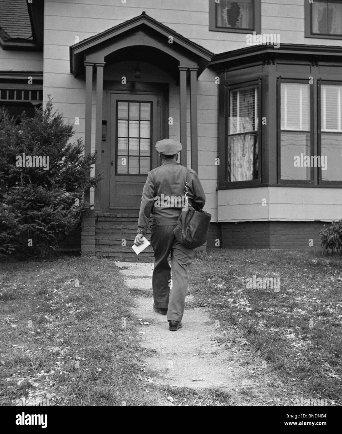 Postman delivering letter hi-res stock photography and images - Alamy