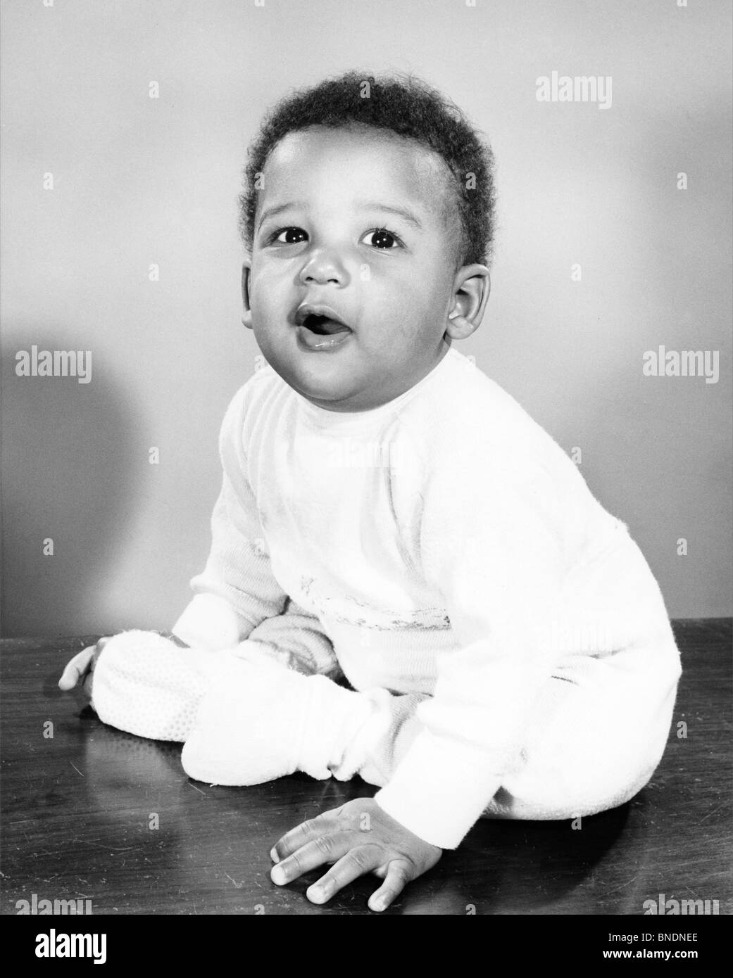 Close-up of a seated baby Stock Photo - Alamy