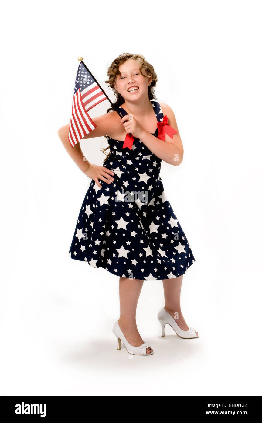 Portrait of young girl in studio full length Stock Photo - Alamy