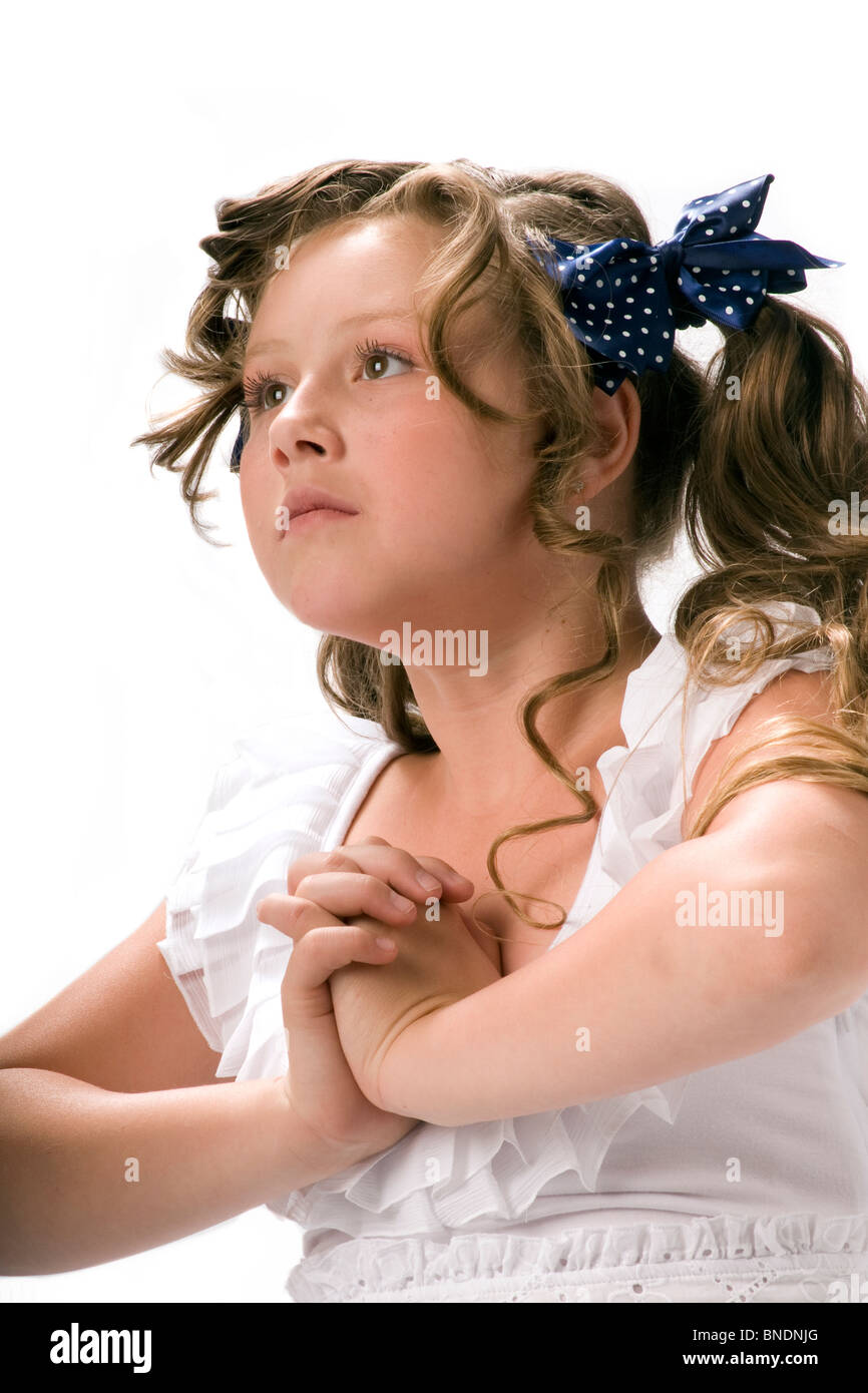 innocent girl on white seamless Stock Photo - Alamy