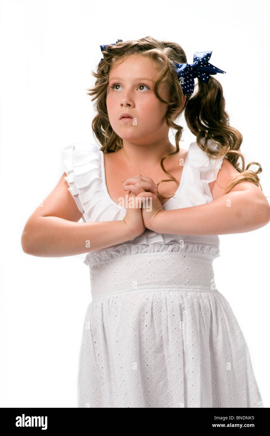 innocent girl on white seamless Stock Photo - Alamy