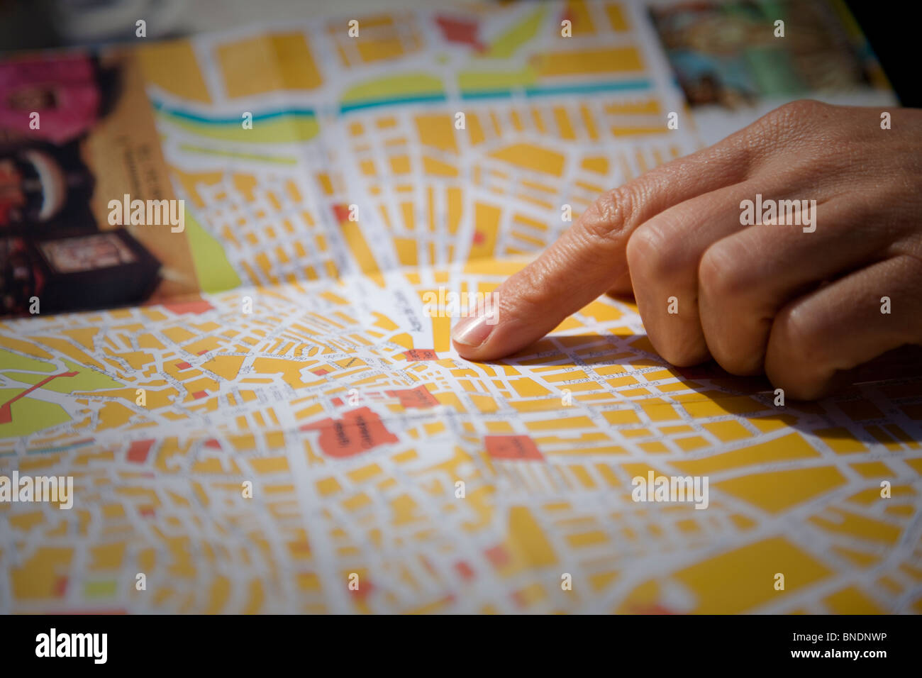 Finger pointing route on map hi-res stock photography and images - Alamy