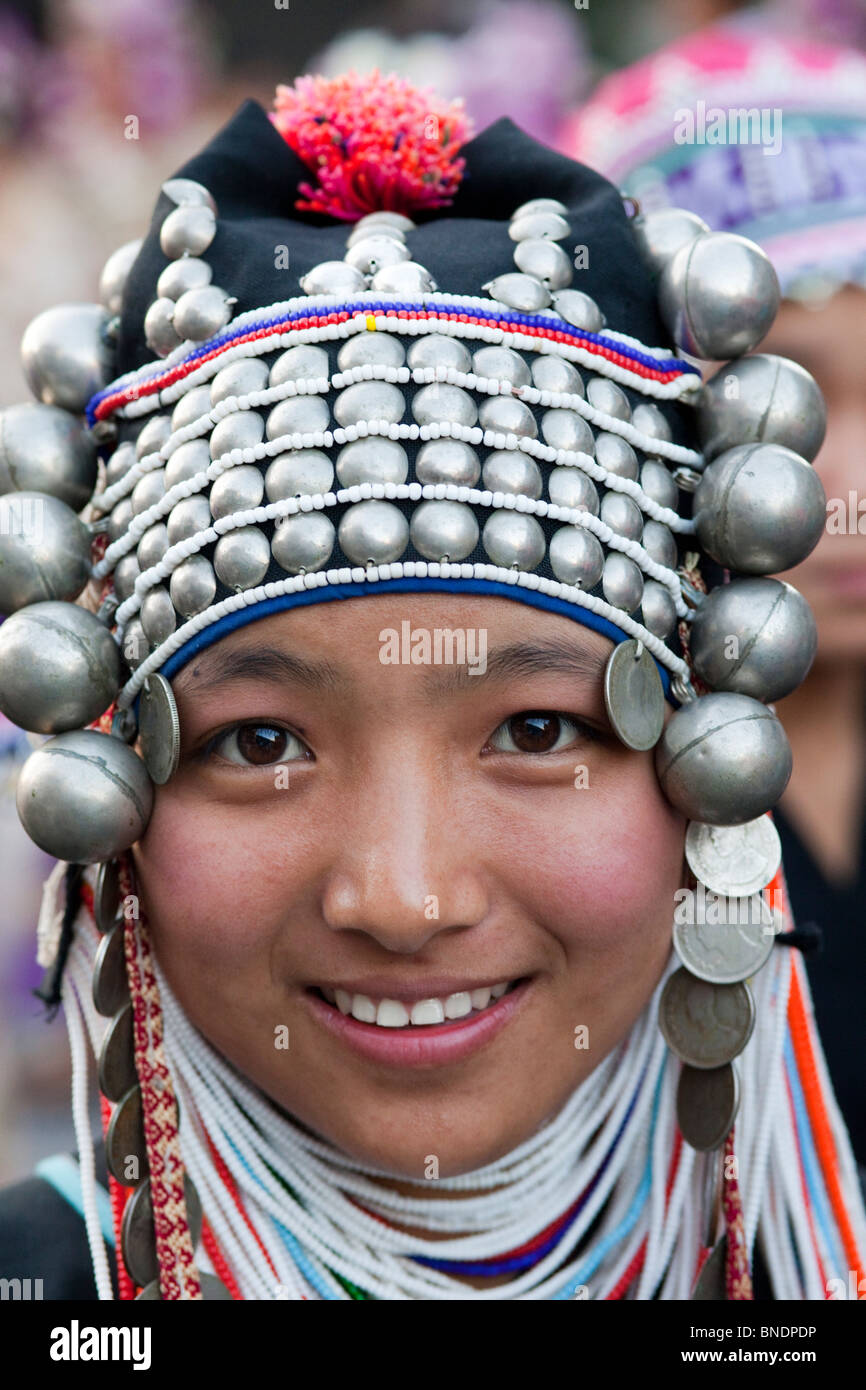 Akha teenage girl in traditional costume in a flower festival, Chiang ...