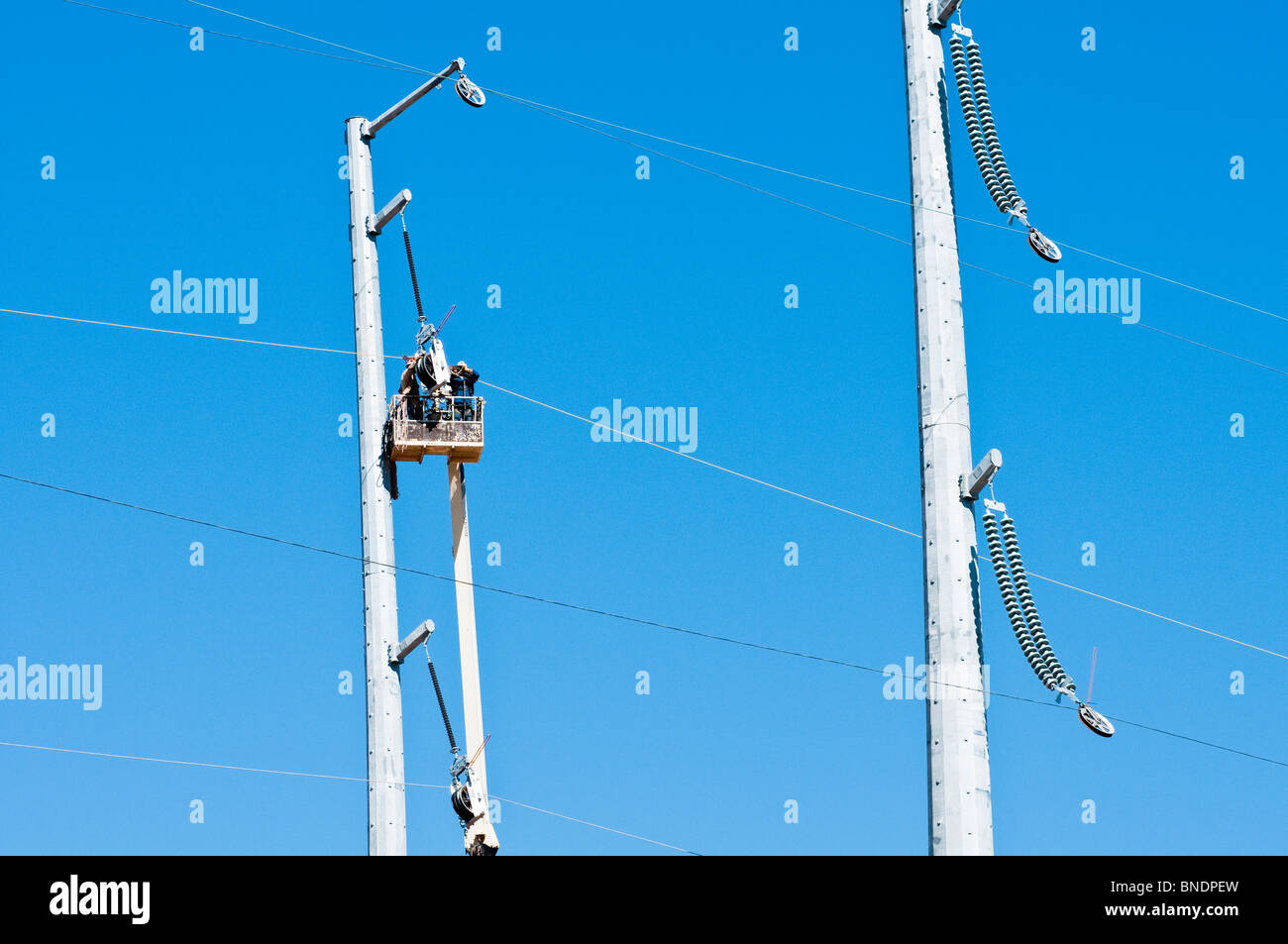 Electrical power lines workers hi-res stock photography and images - Alamy