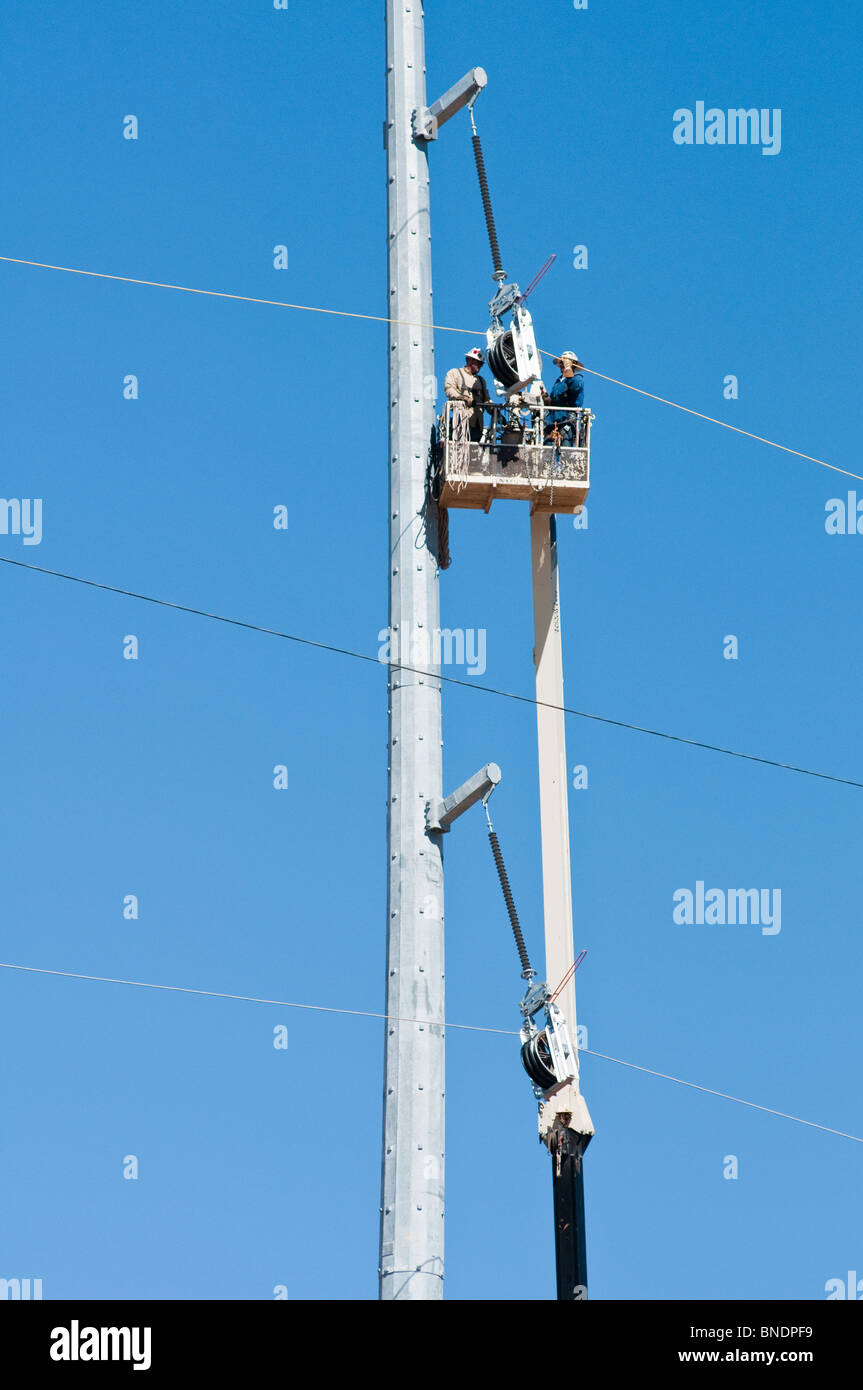 Electrical power lines workers hi-res stock photography and images - Alamy