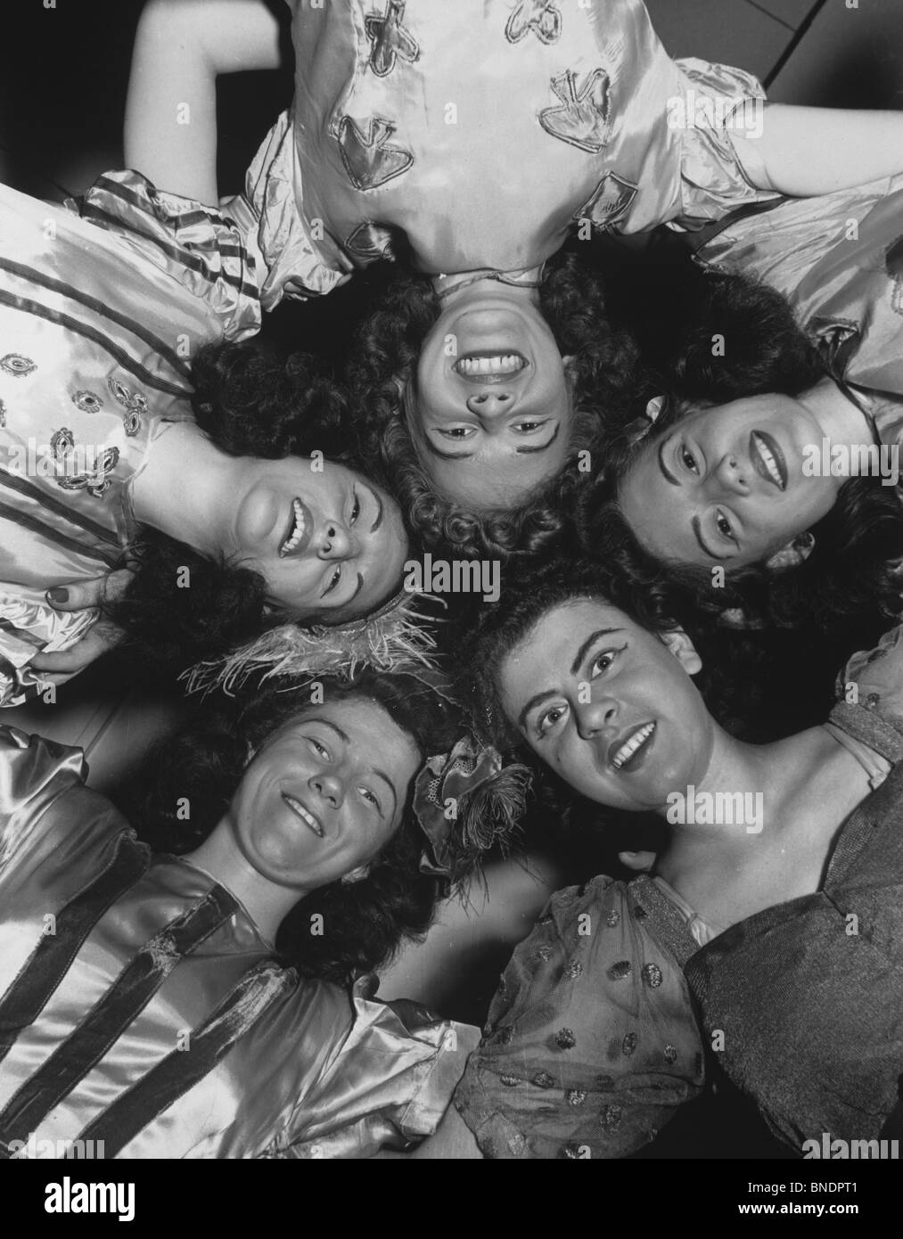 Huddle Black and White Stock Photos & Images - Alamy