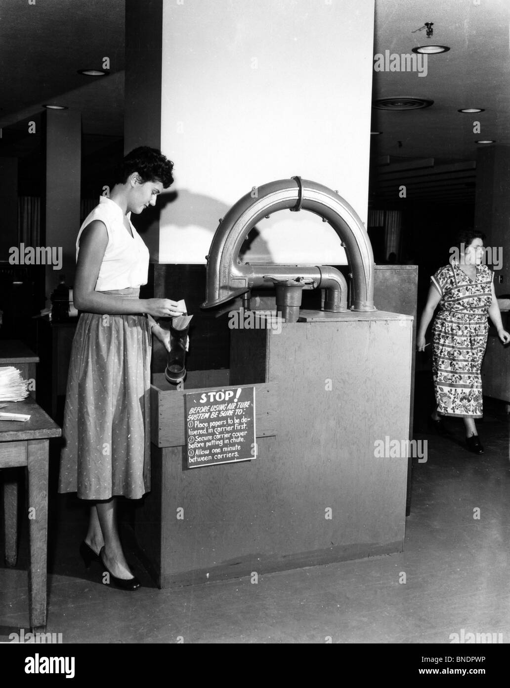 Pneumatic tube message system hi-res stock photography and images - Alamy