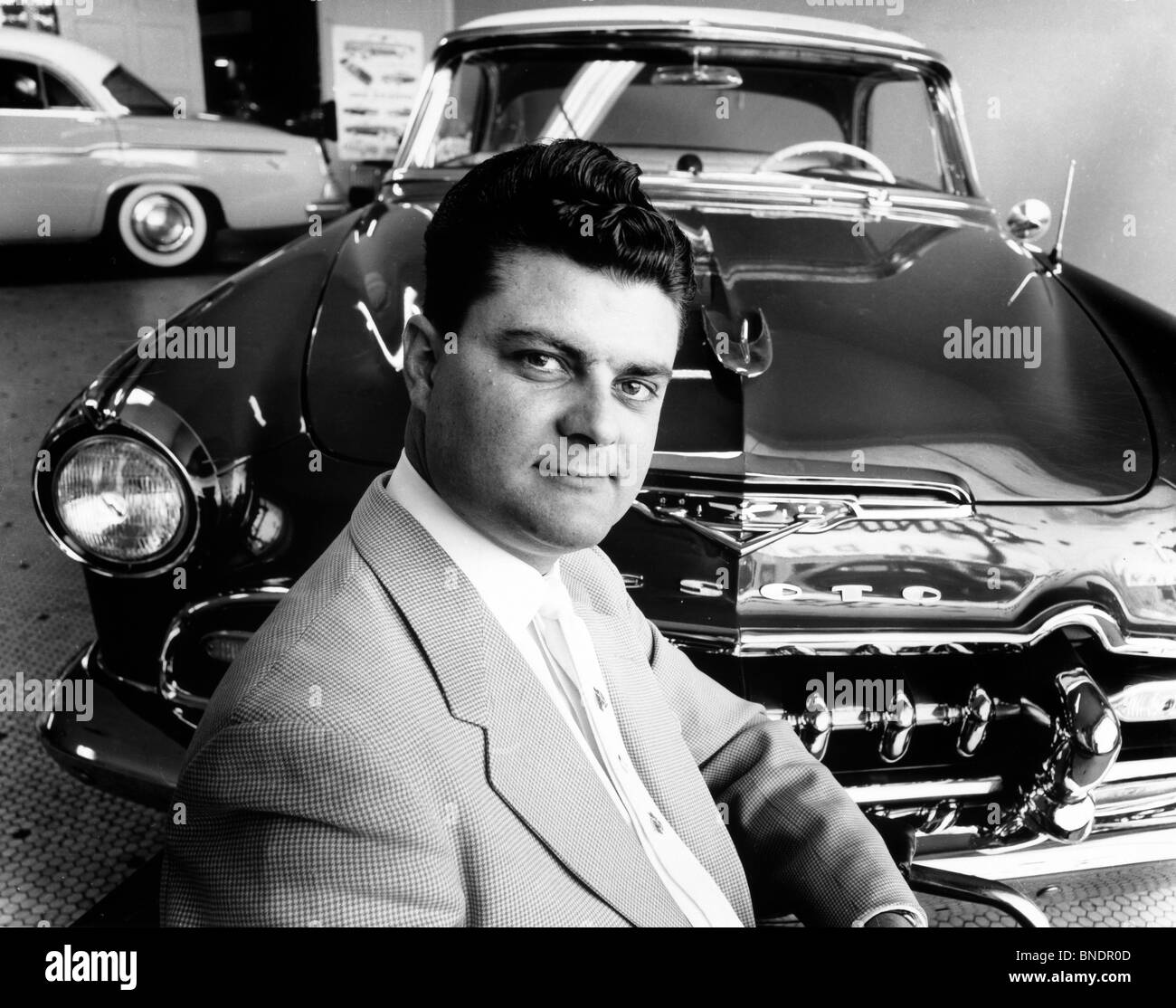 Man in front car Black and White Stock Photos & Images - Alamy
