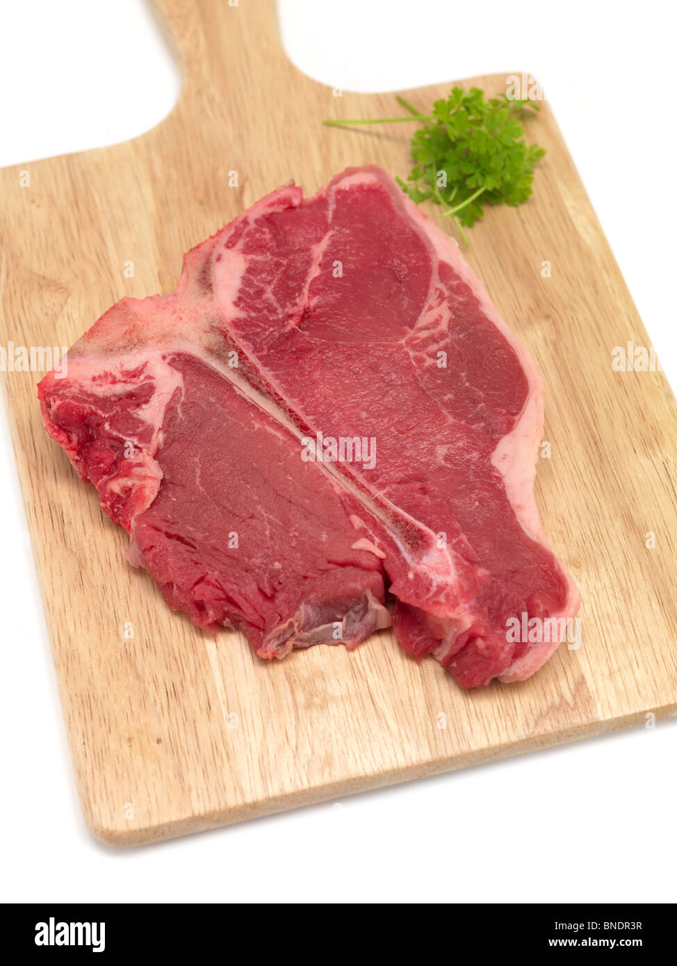 A raw t-bone steak Stock Photo - Alamy