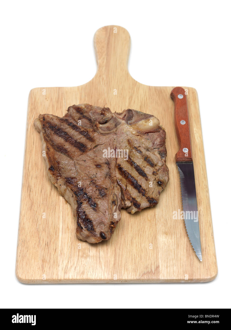 A cooked t-bone steak Stock Photo - Alamy