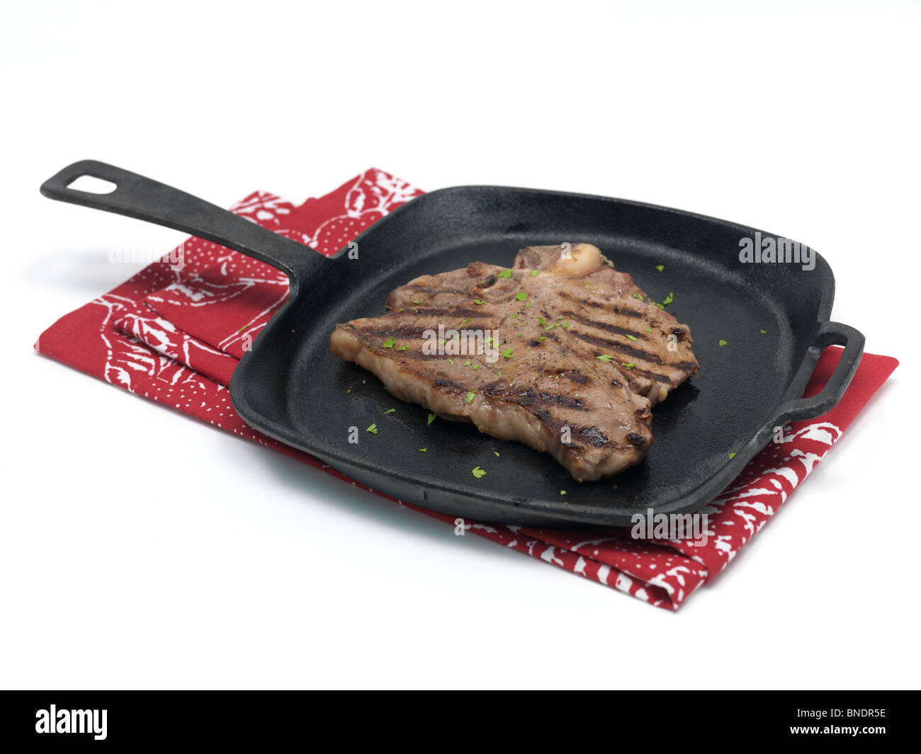 A cooked t-bone steak Stock Photo - Alamy