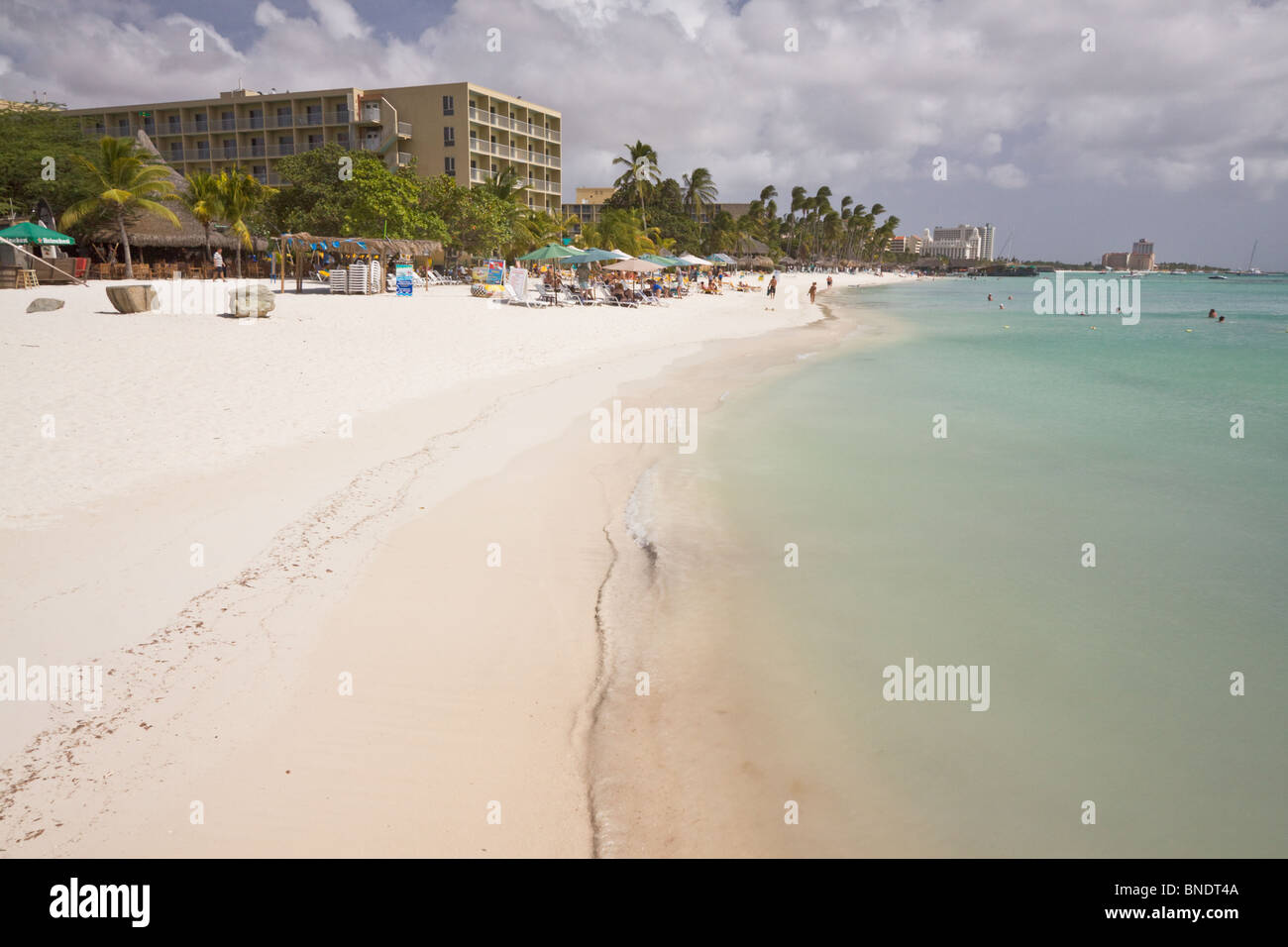 Beautiful calm blue waters at beach in Aruba Stock Photo - Alamy