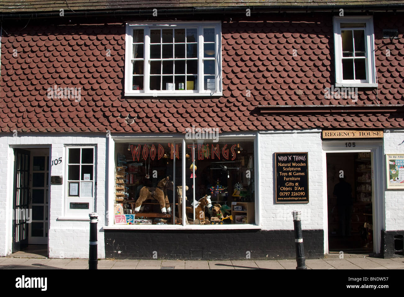 old traditional high street shop window customer Stock Photo - Alamy