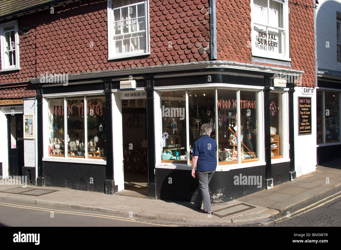 old traditional high street shop window customer Stock Photo - Alamy