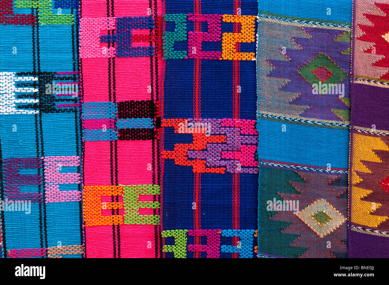 Colorful traditional rugs at a market stall, Antigua, Guatemala Stock ...