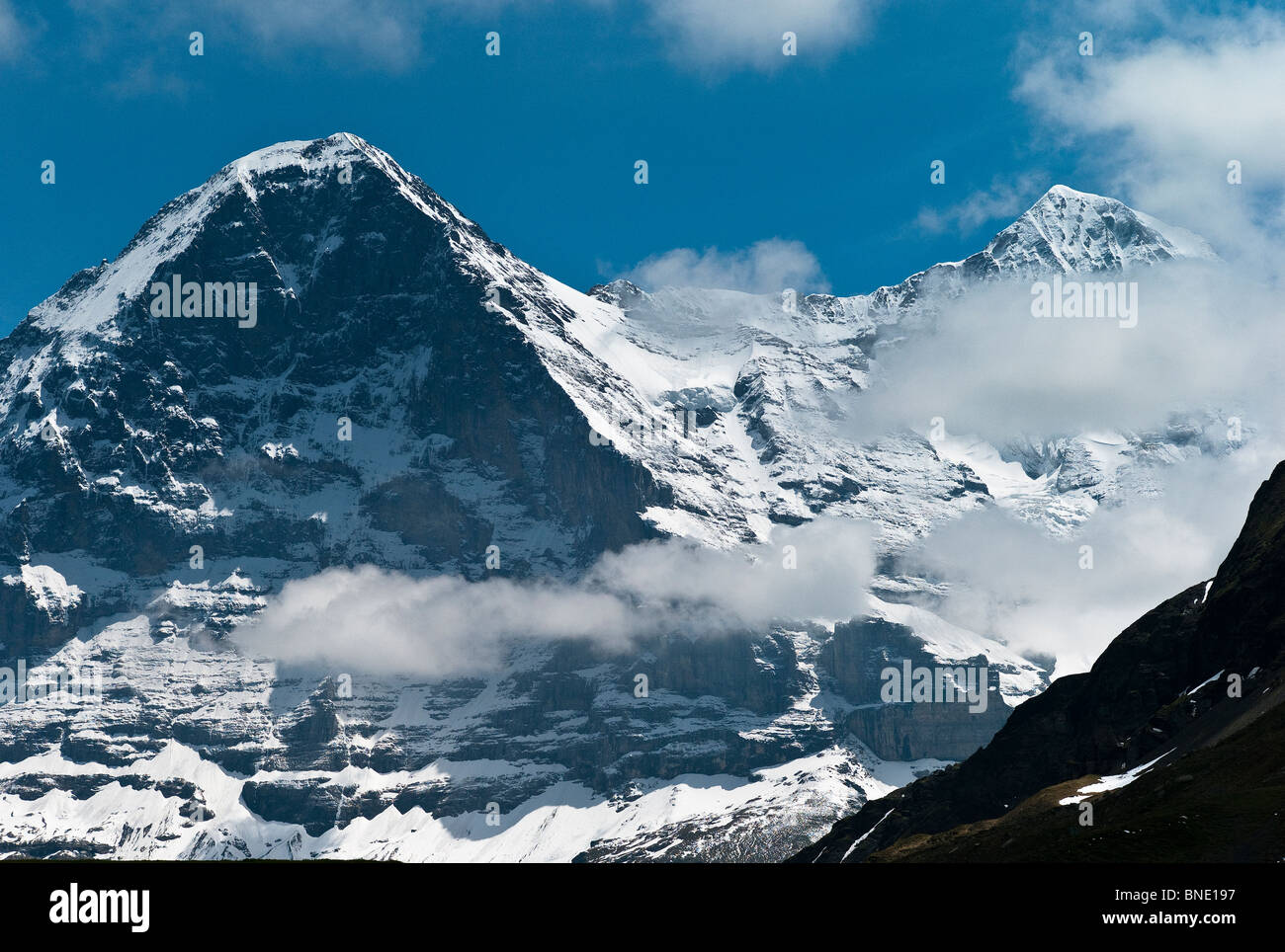 North face of the Eiger mountain in Swiss Alps with low cloud ...
