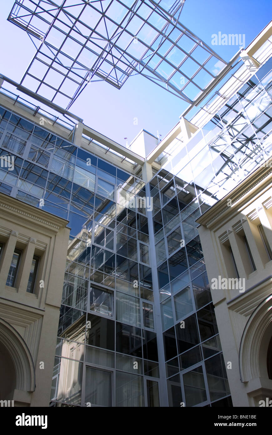 Modern building close-up toned in blue color Stock Photo - Alamy