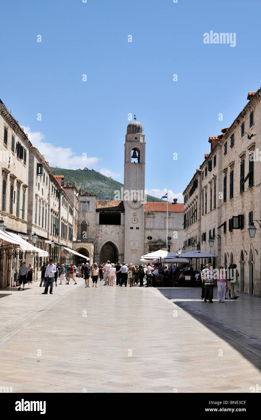 Tourists enjoying the sights of Luza Square with its Bell Tower and ...