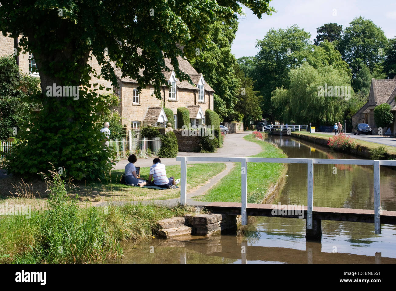 Lower Slaughter quaint village by stream cotswolds stone houses england ...