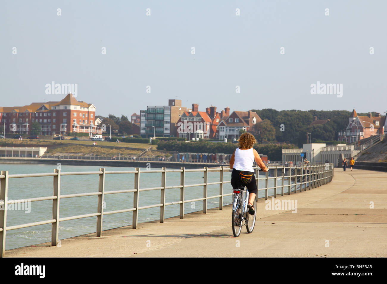 Woman rides bicycle on promenade hi-res stock photography and images ...