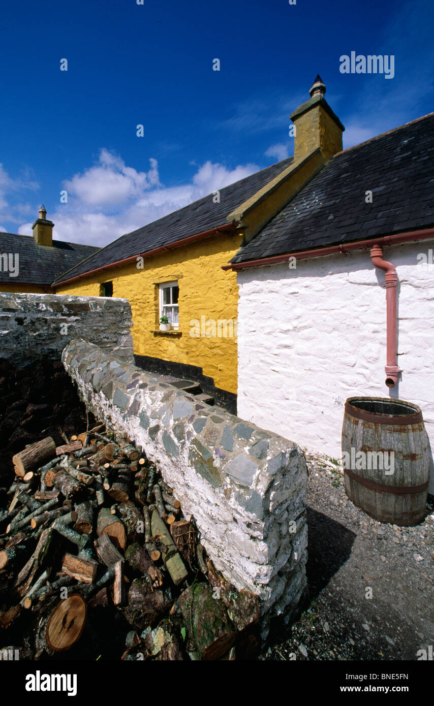 Wooden logs beside a stone wall, Killarney, County Kerry, Ireland Stock ...