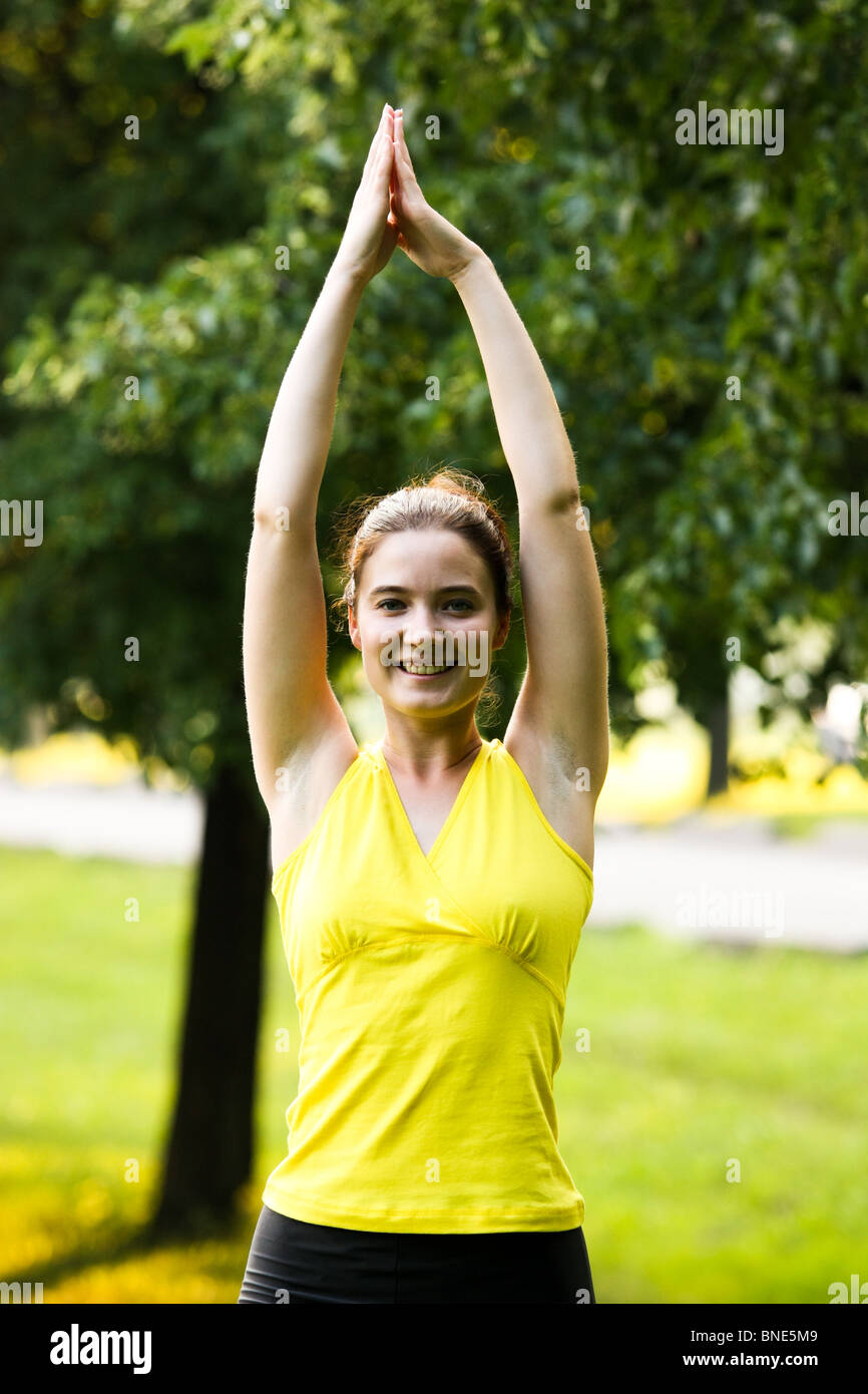 happy young woman arm stretching outdoor evening Stock Photo - Alamy