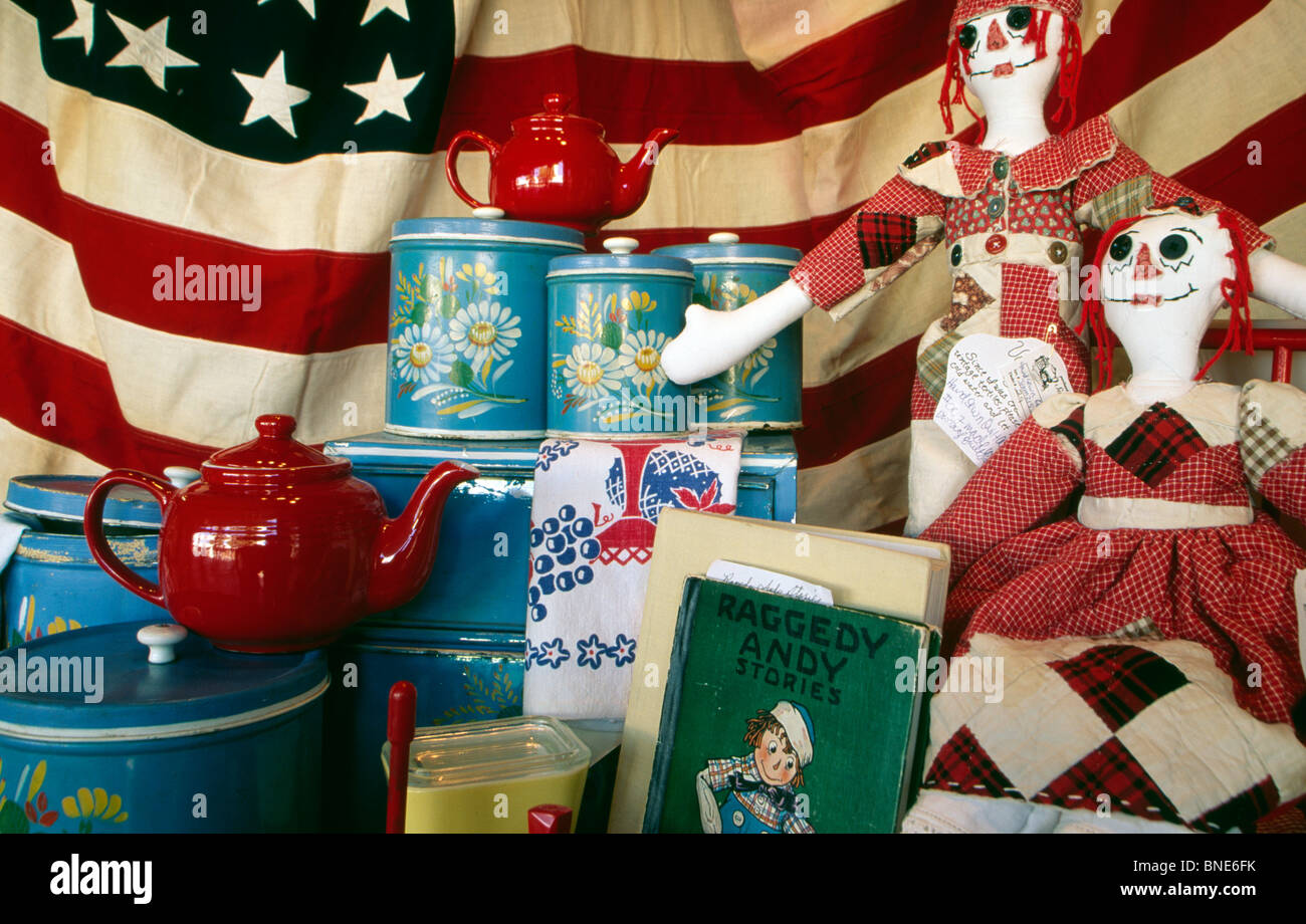 Various historic objects in museum exhibition with American flag in ...