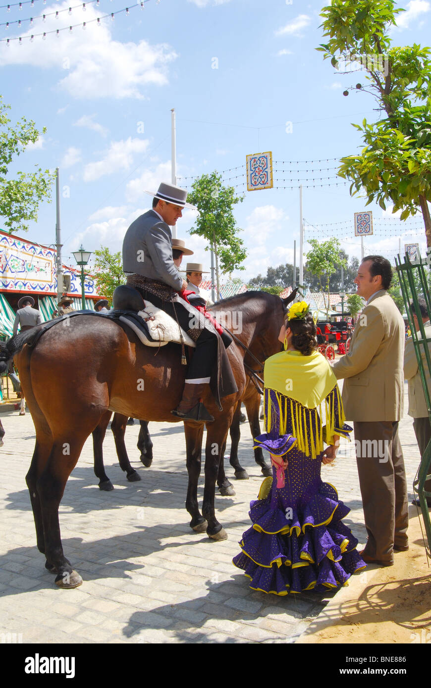 People in traditional dress, Feria ground, April spring fair, Seville ...