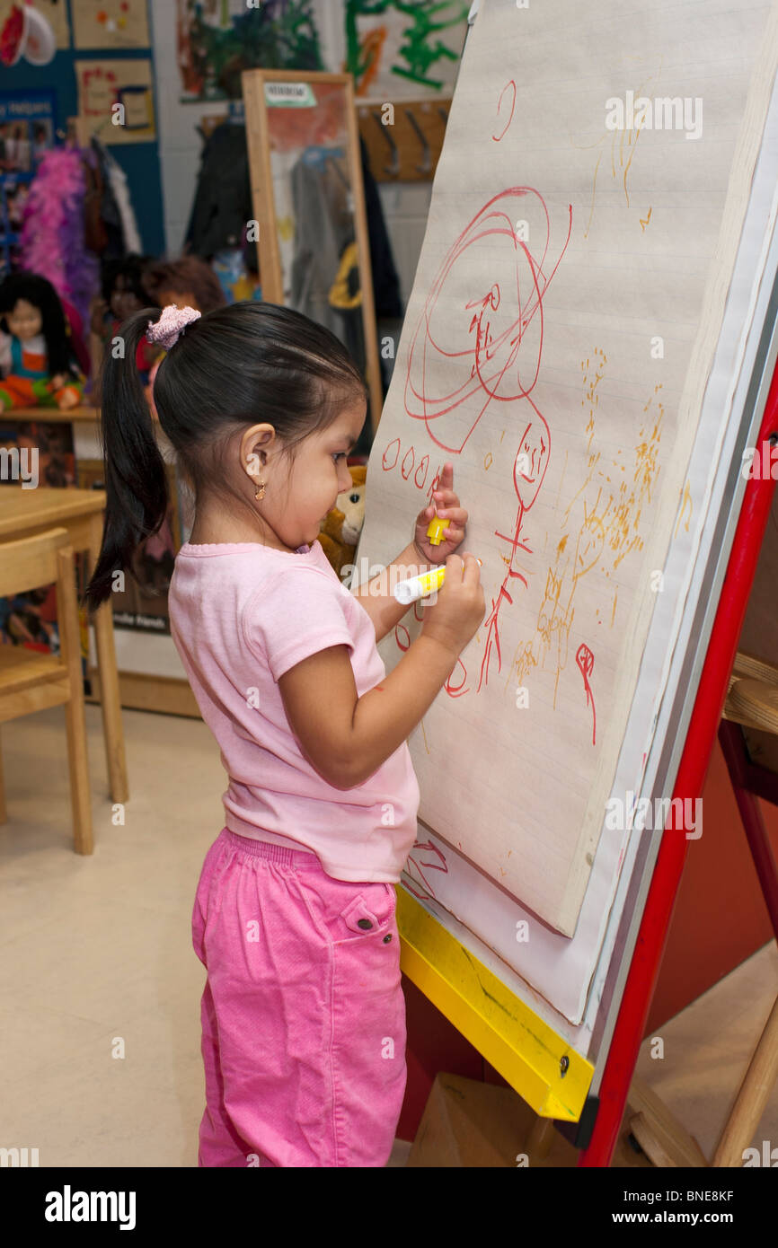Four year old girl drawing High Resolution Stock Photography and Images ...