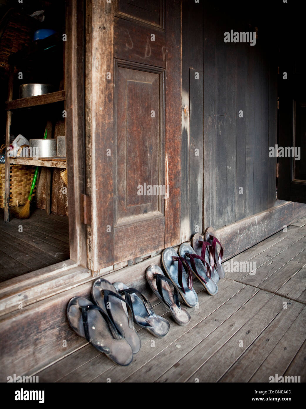 Slippers outside a monastery, Myanmar Stock Photo - Alamy