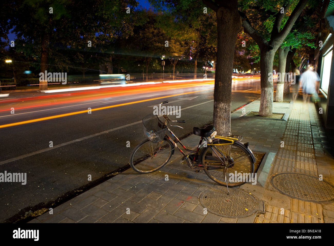Bicycle parked at the roadside, Beijing, China Stock Photo - Alamy