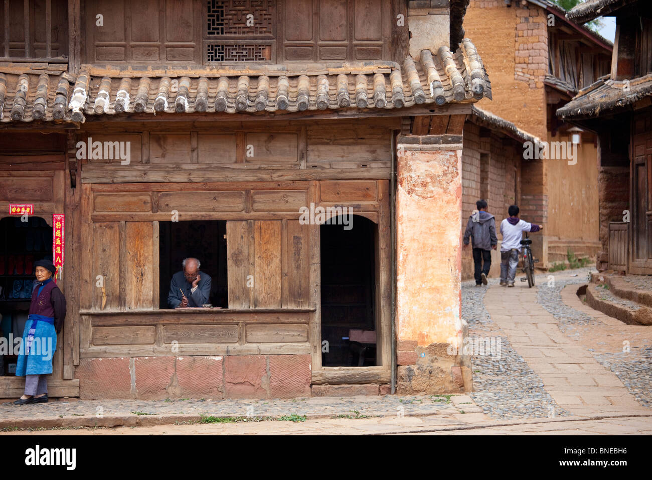 Old man writing calligraphy in Shaxi Village, Yunnan Province, China ...