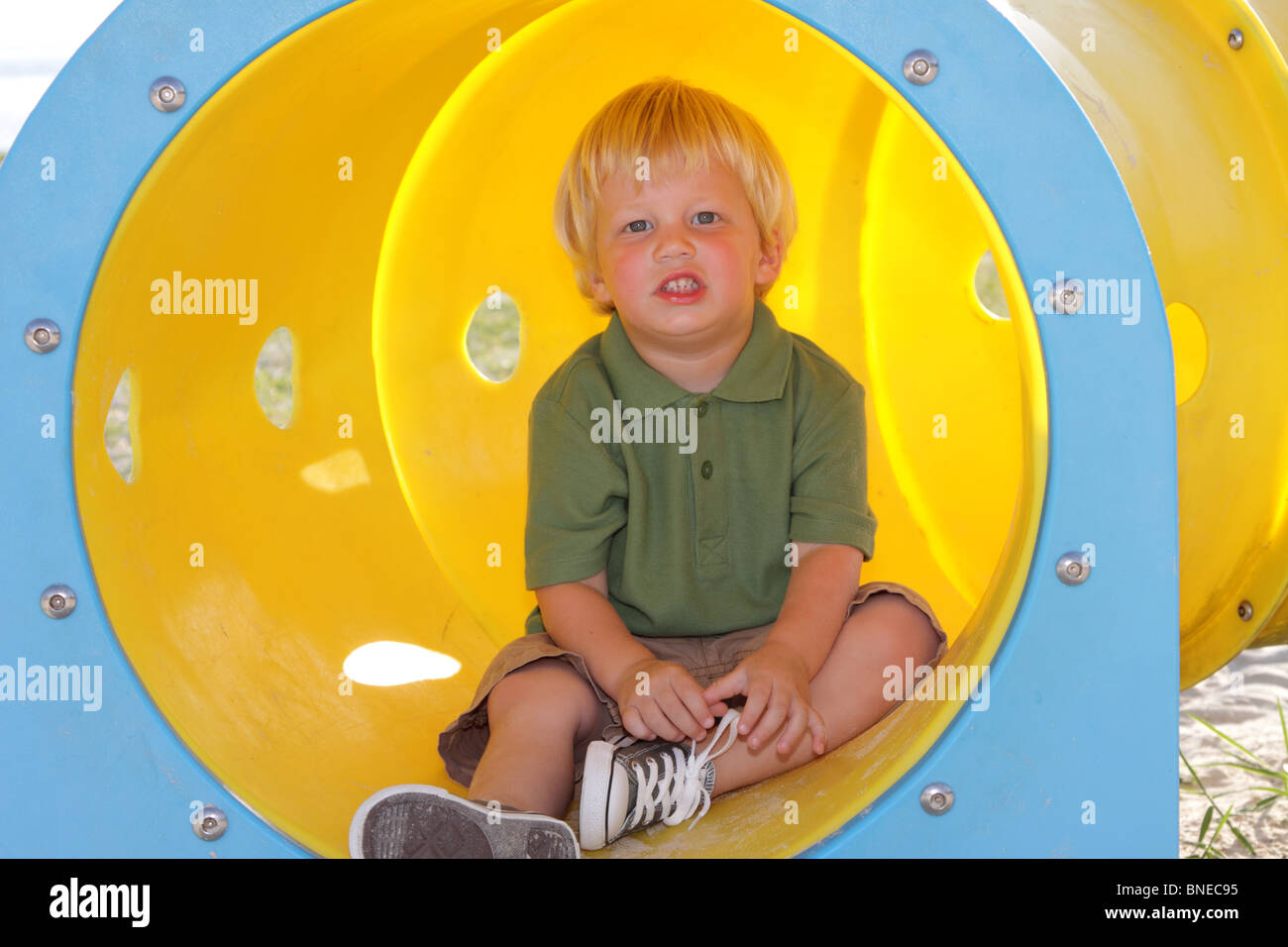 A Young Boy Playing in a Park Stock Photo - Alamy