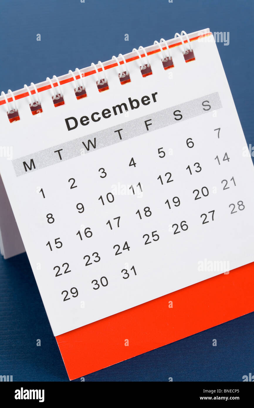 Calendar December close up with blue background Stock Photo - Alamy