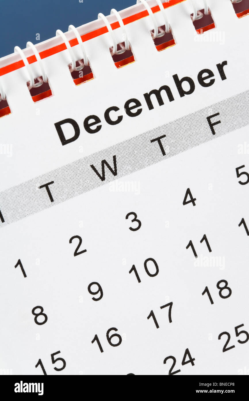 Calendar December close up with blue background Stock Photo - Alamy