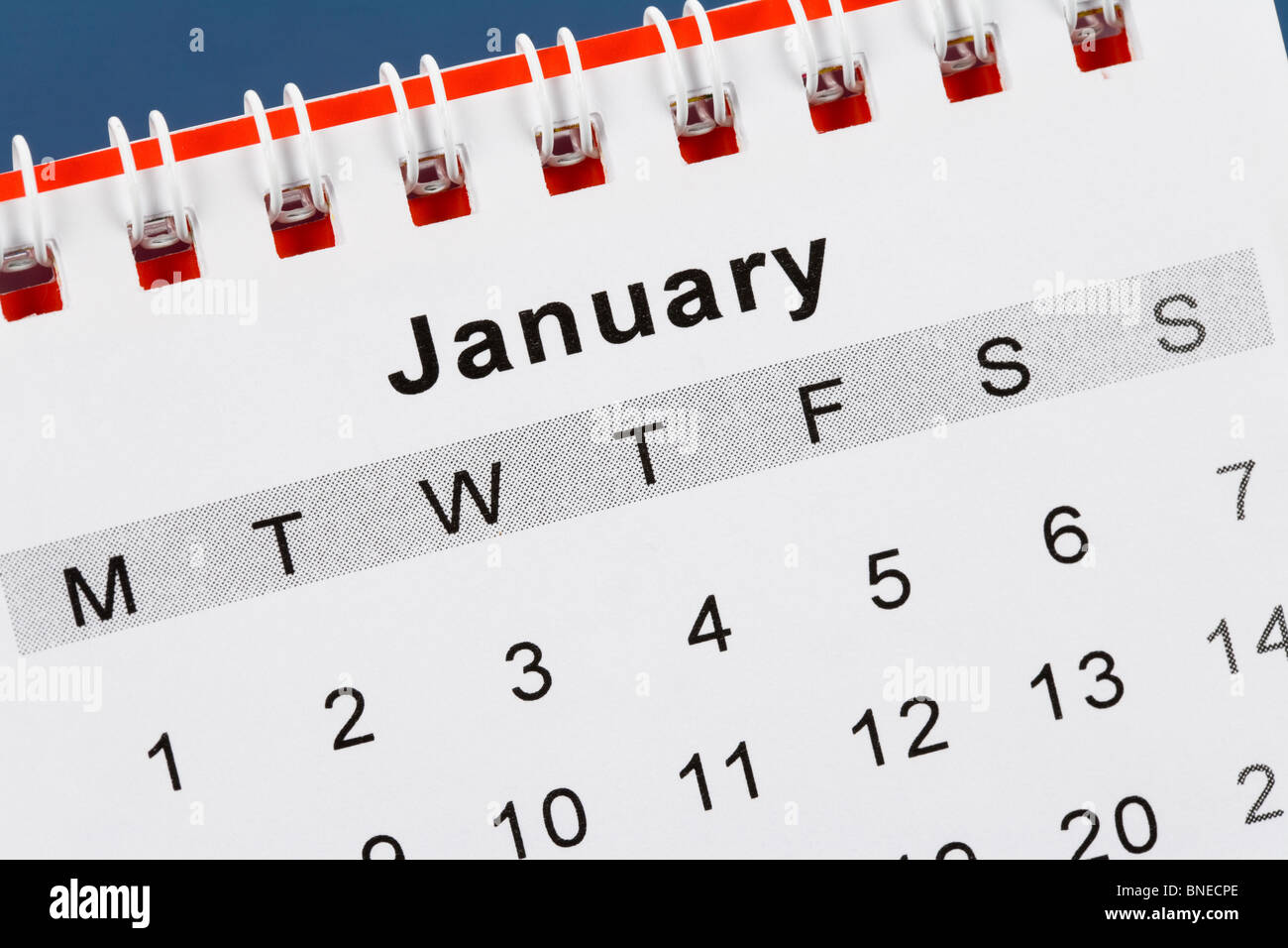 Calendar January close up with blue background Stock Photo - Alamy