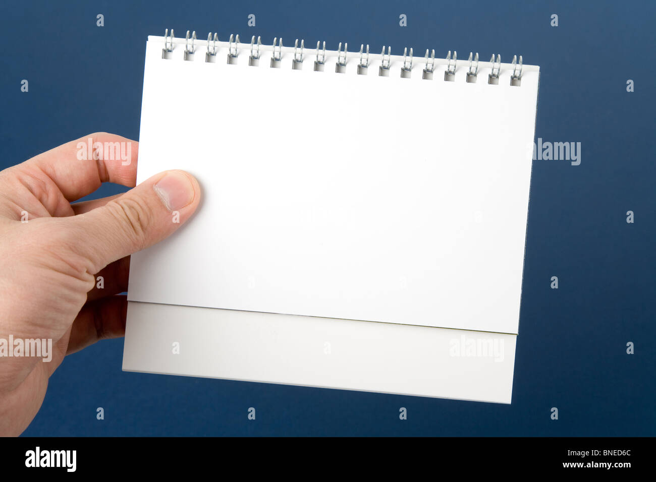 Holding calendar page hi-res stock photography and images - Alamy