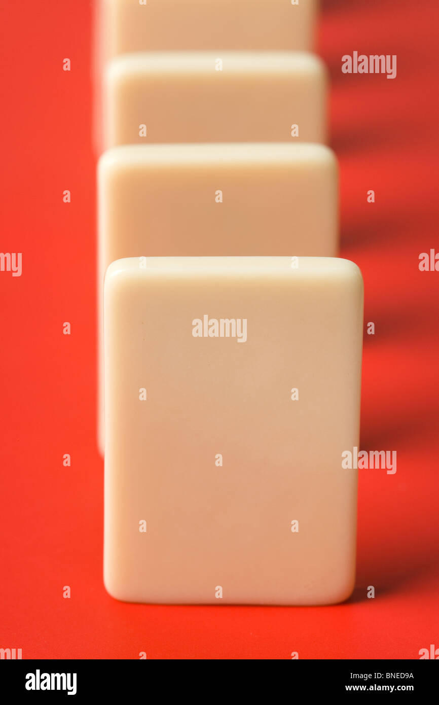 Domino with red background, Concept of Cause or Teamwork Stock Photo ...