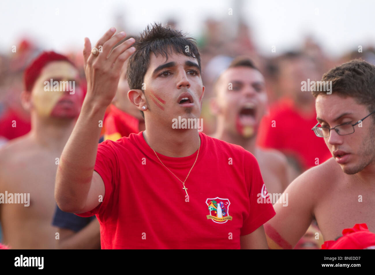 Spanish soccer fans cheer for their team at a public viewing in Las ...