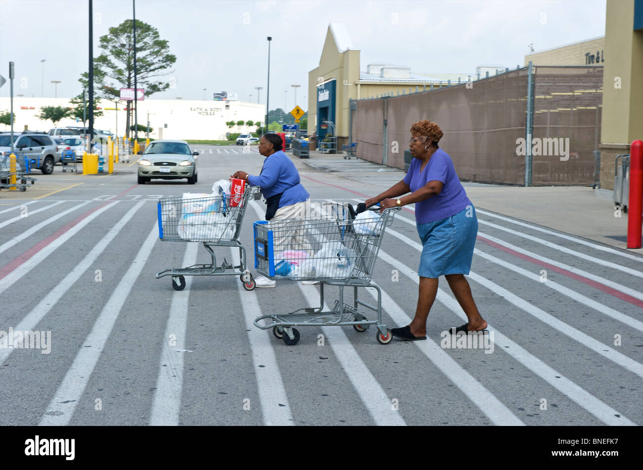 Two shoppers leaving Wal-mart super center, Texas, USA Stock Photo - Alamy