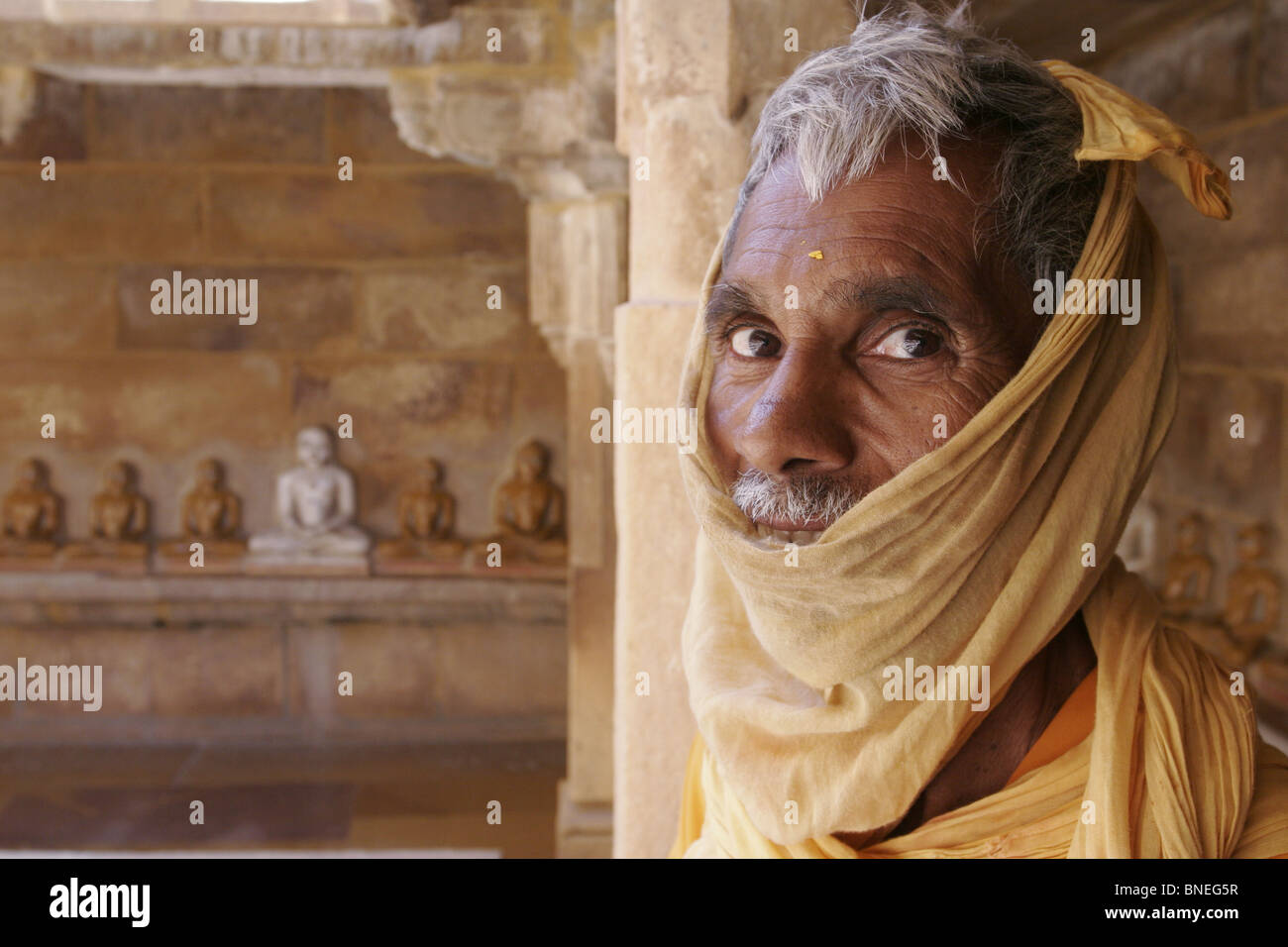Priest inside a Jain Temple in Jaisalmer, Rajasthan, India Stock Photo ...