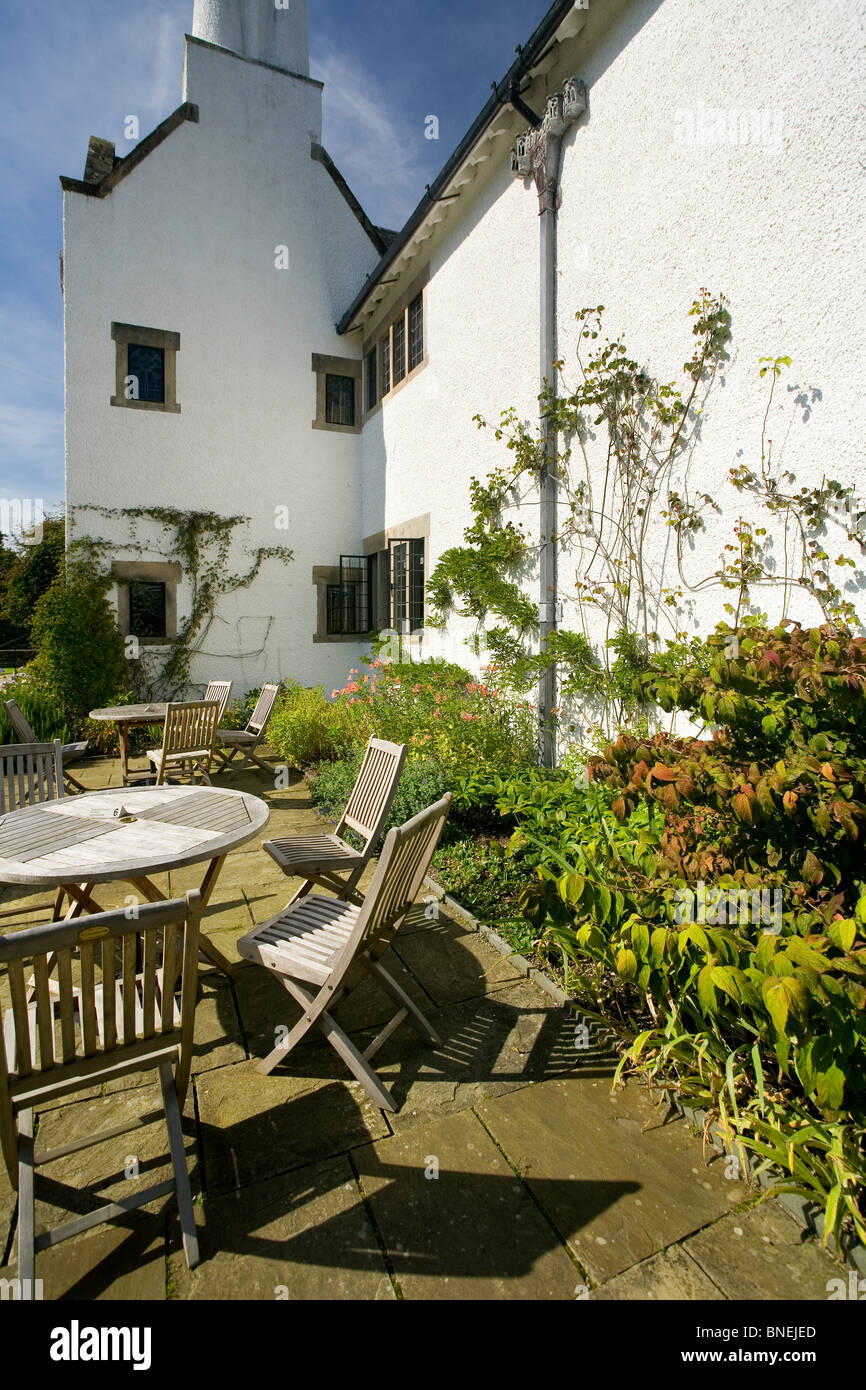 Tables and chairs on the rear terrace at Blackwell House in the Lake ...