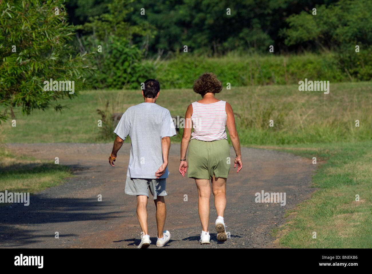 A white Caucasian couple out for an early morning walk Stock Photo - Alamy