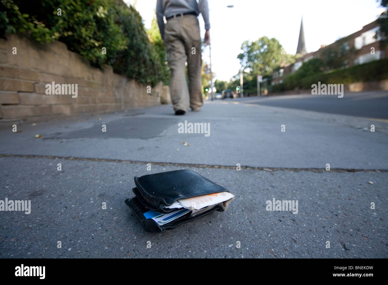 A wallet in a suburban street in London, England Stock Photo - Alamy