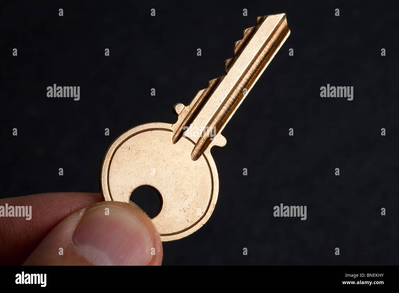 Golden House Key close up Stock Photo - Alamy